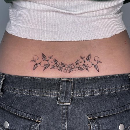 Tramp Stamp Tattoo: History, Modern Trends, and Design Ideas | VeAn Tattoo