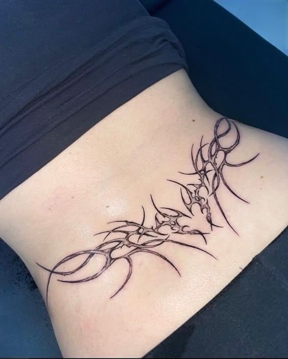 Tramp Stamp Tattoo: History, Modern Trends, and Design Ideas | VeAn Tattoo